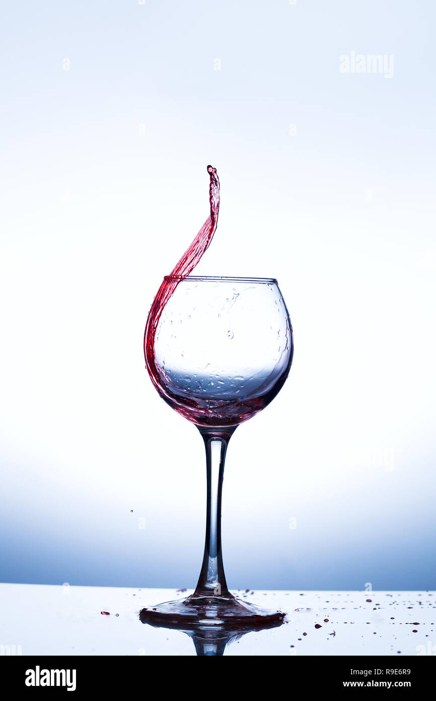 Wine splashing in glass, acrylic background, studio lighting Stock ...