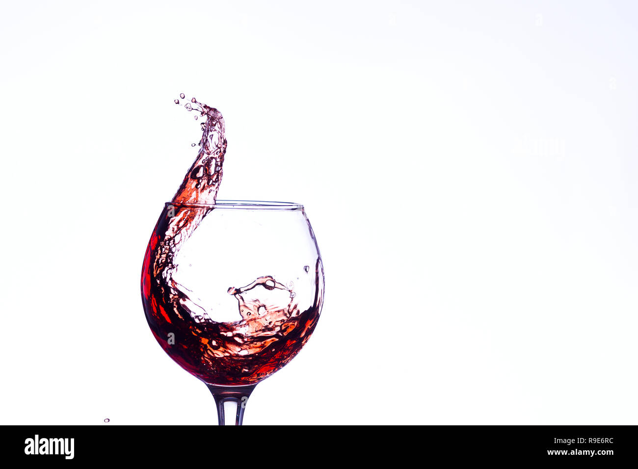 Wine splashing in glass, acrylic background, studio lighting Stock ...