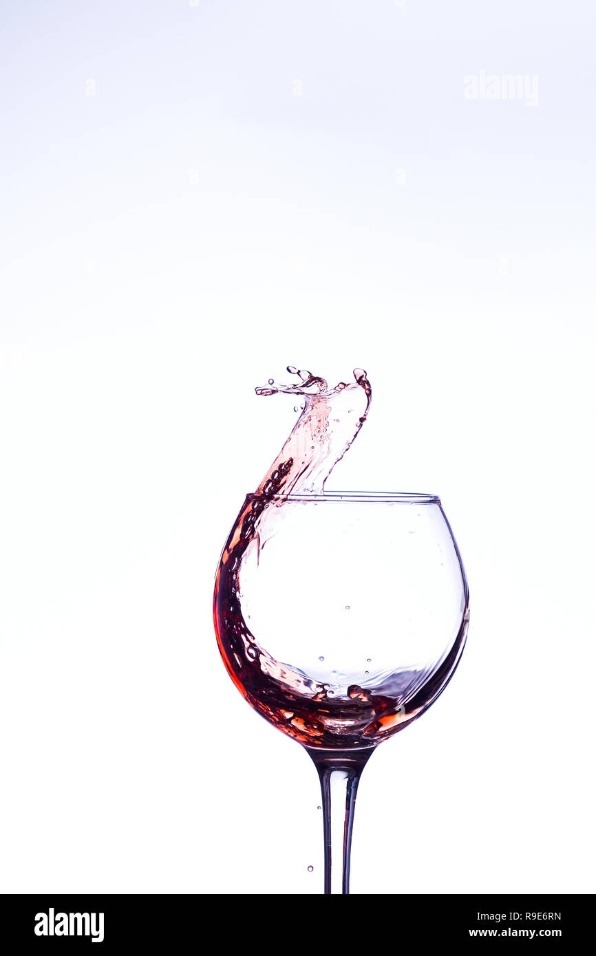 Wine splashing in glass, acrylic background, studio lighting Stock ...
