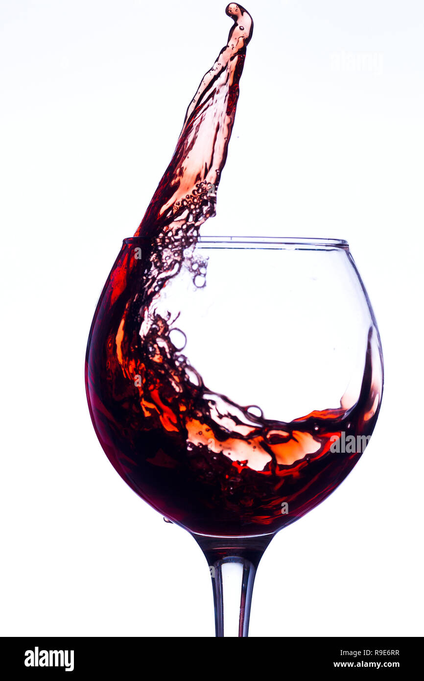 Wine splashing in glass, acrylic background, studio lighting Stock ...