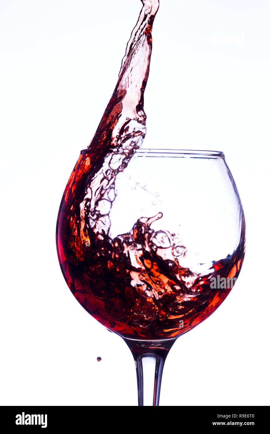 Wine splashing in glass, acrylic background, studio lighting Stock ...