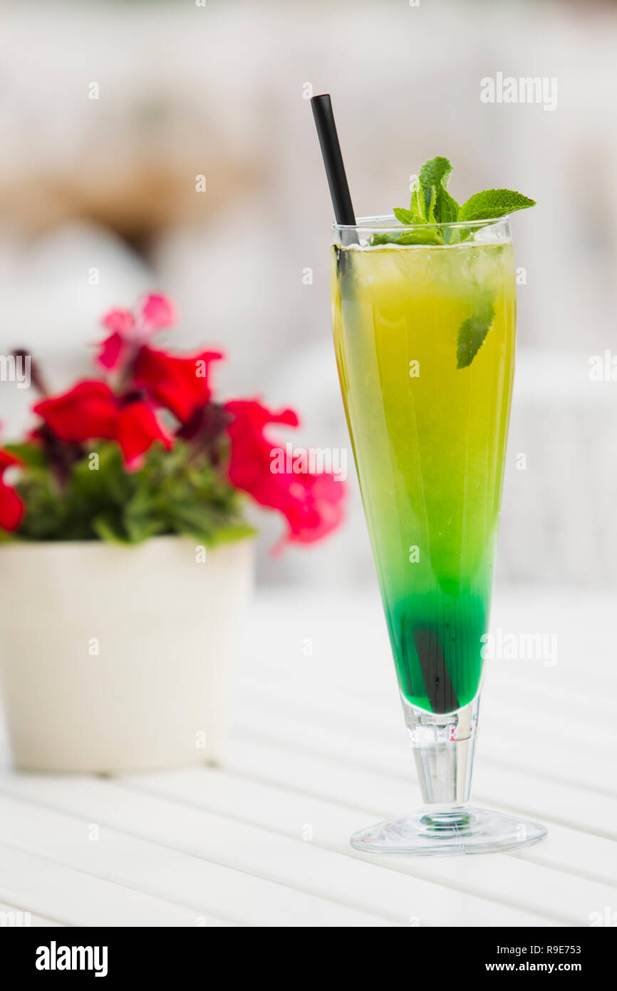 The cold lemonade with mint and ice on the outdoor veranda summer day ...