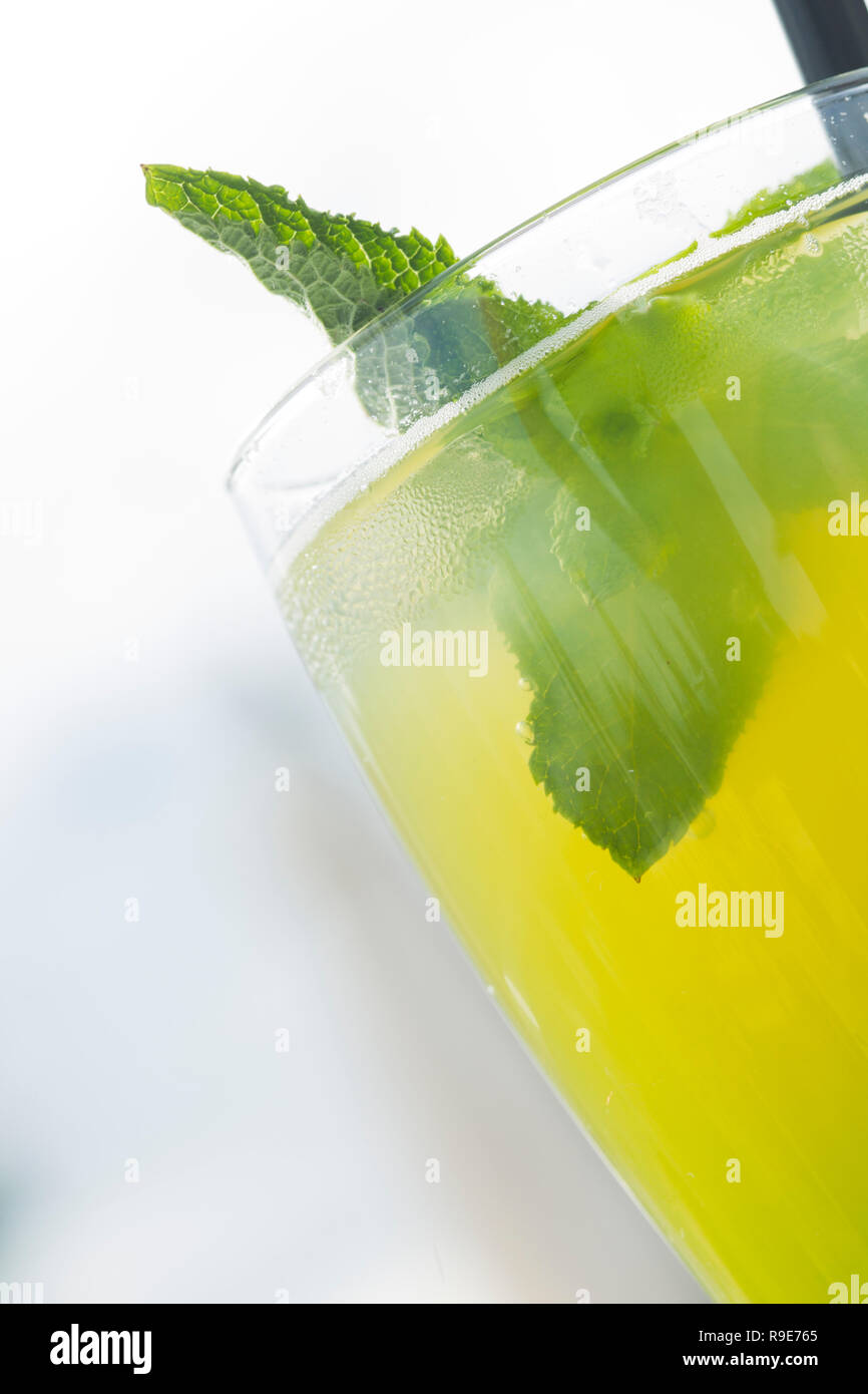 The cold lemonade with mint and ice on the outdoor veranda summer day ...