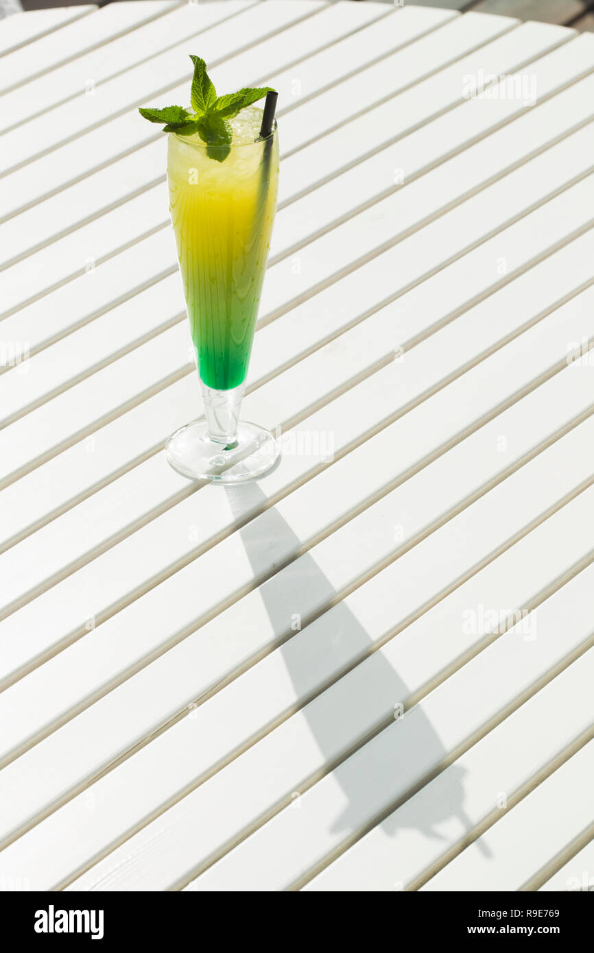 The cold lemonade with mint and ice on the outdoor veranda summer day ...