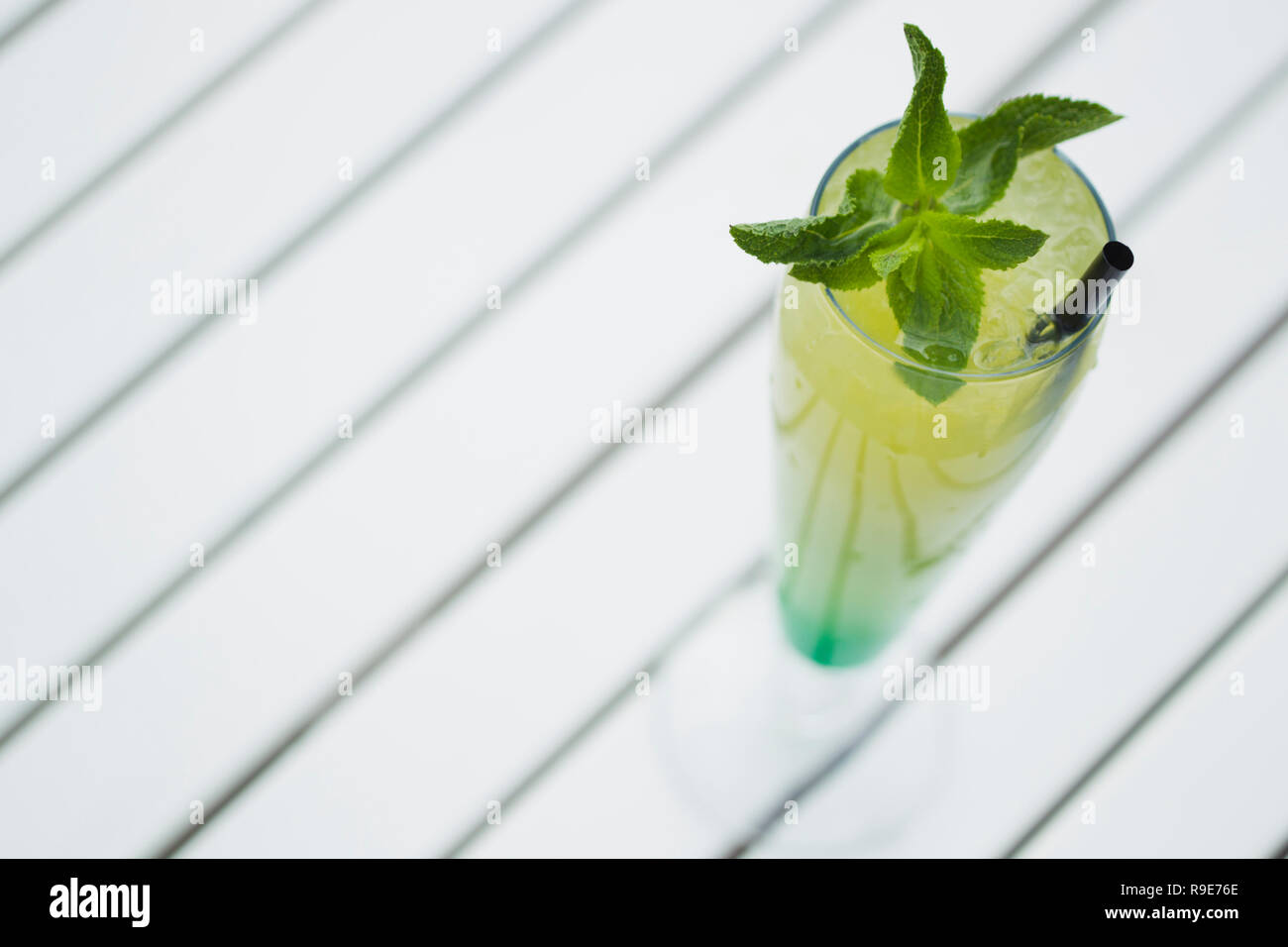 The cold lemonade with mint and ice on the outdoor veranda summer day ...