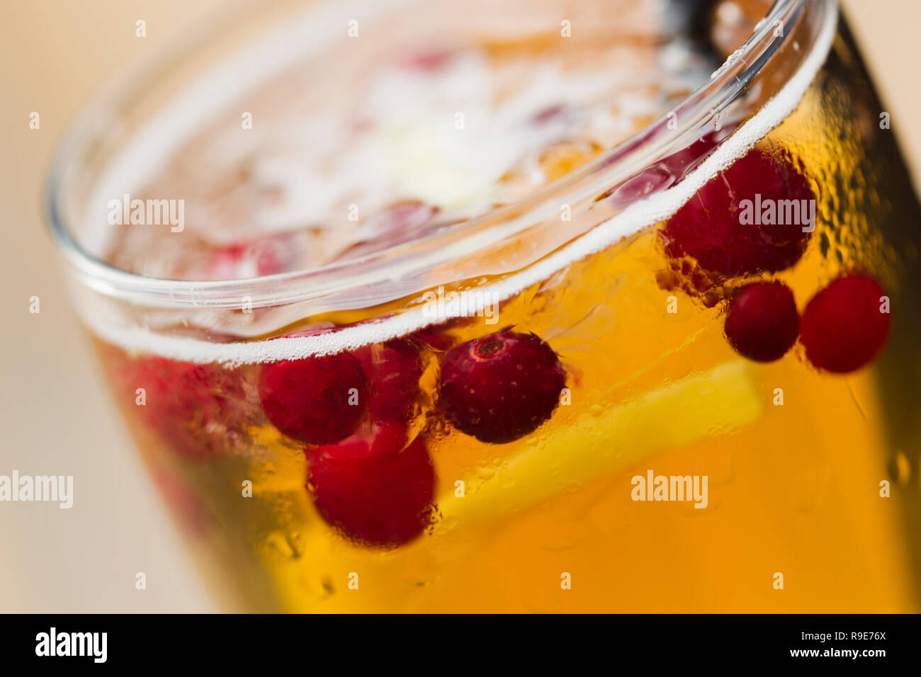 Cold lemonade with cranberries, ginger and ice on the outdoor veranda ...