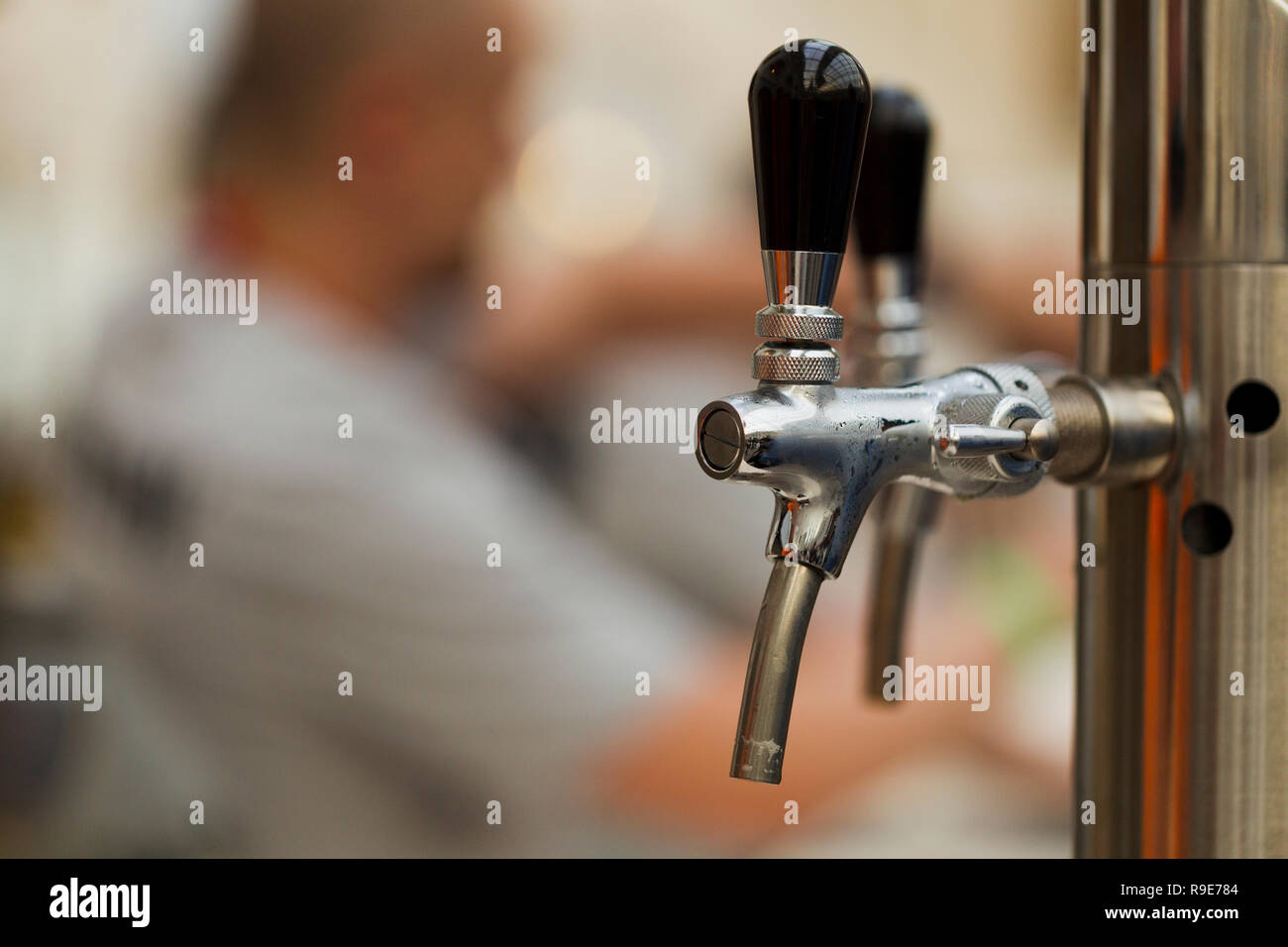 Bright metal beer tap, natural light, sunlight Stock Photo - Alamy