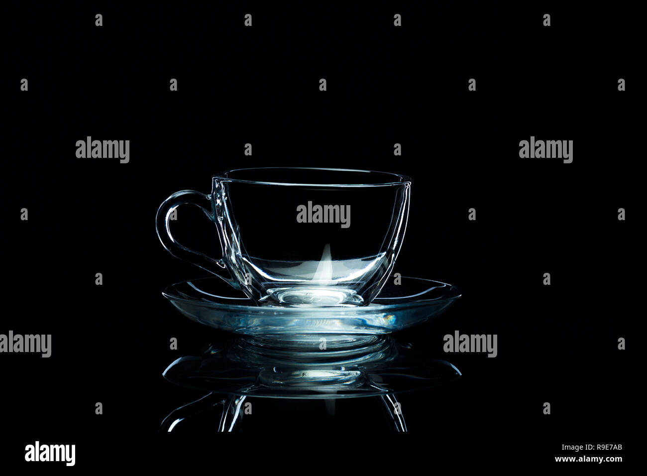 Clean glassware on a black background, studio light Stock Photo - Alamy
