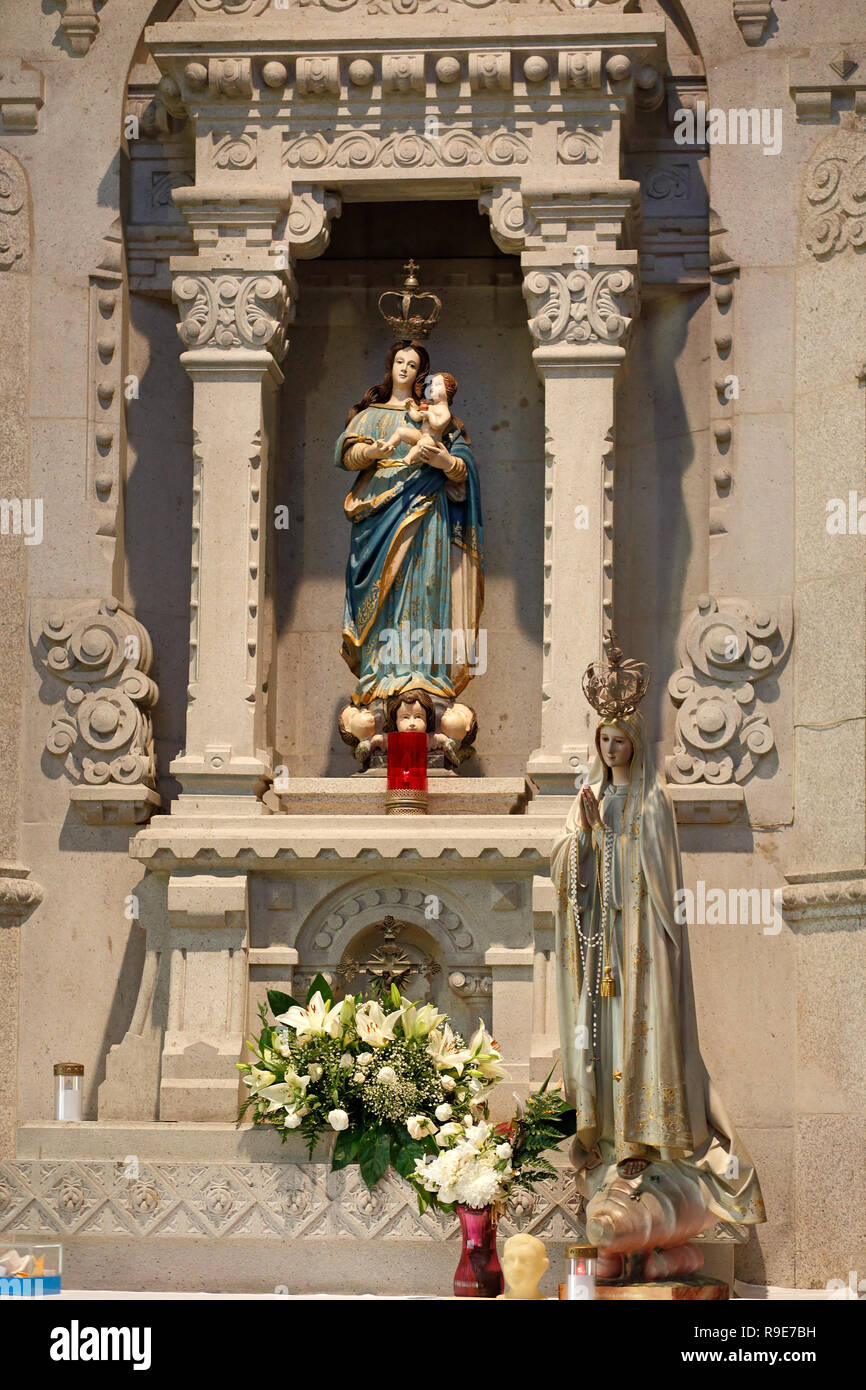 One of the beautiful side altars of the church of Santa Luzia in Viana ...