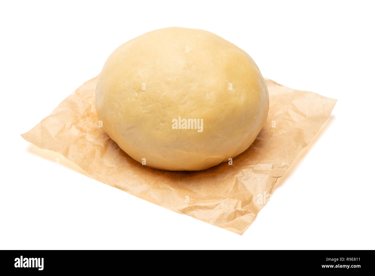 unrolled and unbaked Shortcrust pastry dough on white background Stock ...