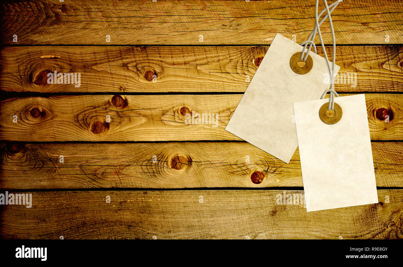 Two labels and old wooden boards Stock Photo - Alamy