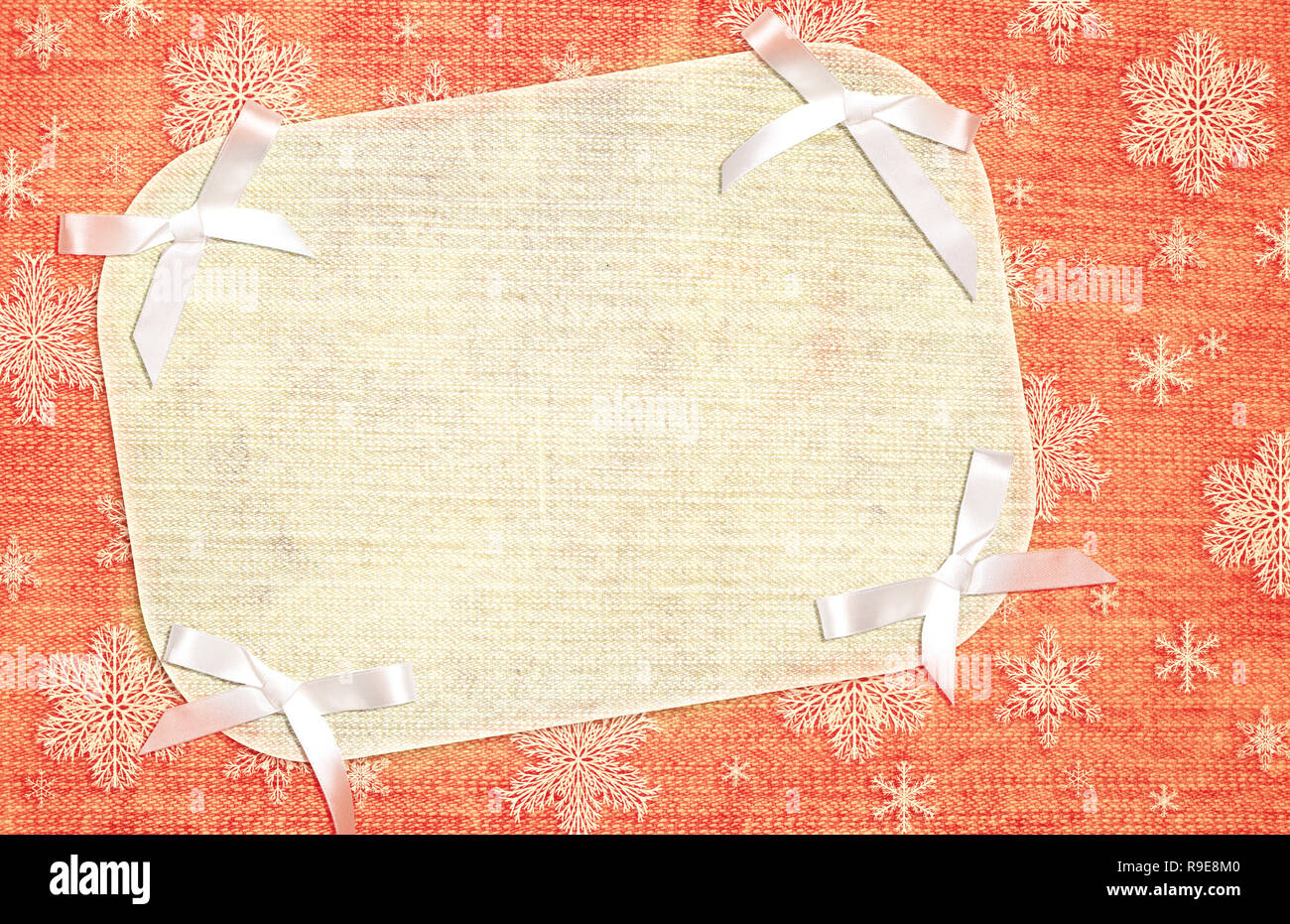Christmas background with fabric texture and bows Stock Photo - Alamy