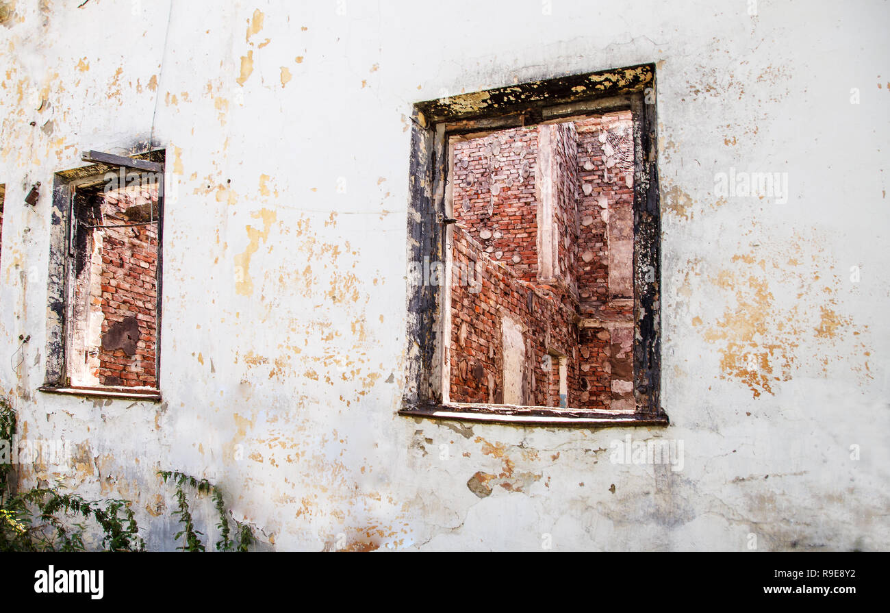 two broken windows in an abandoned house outdoor closeup Stock Photo ...
