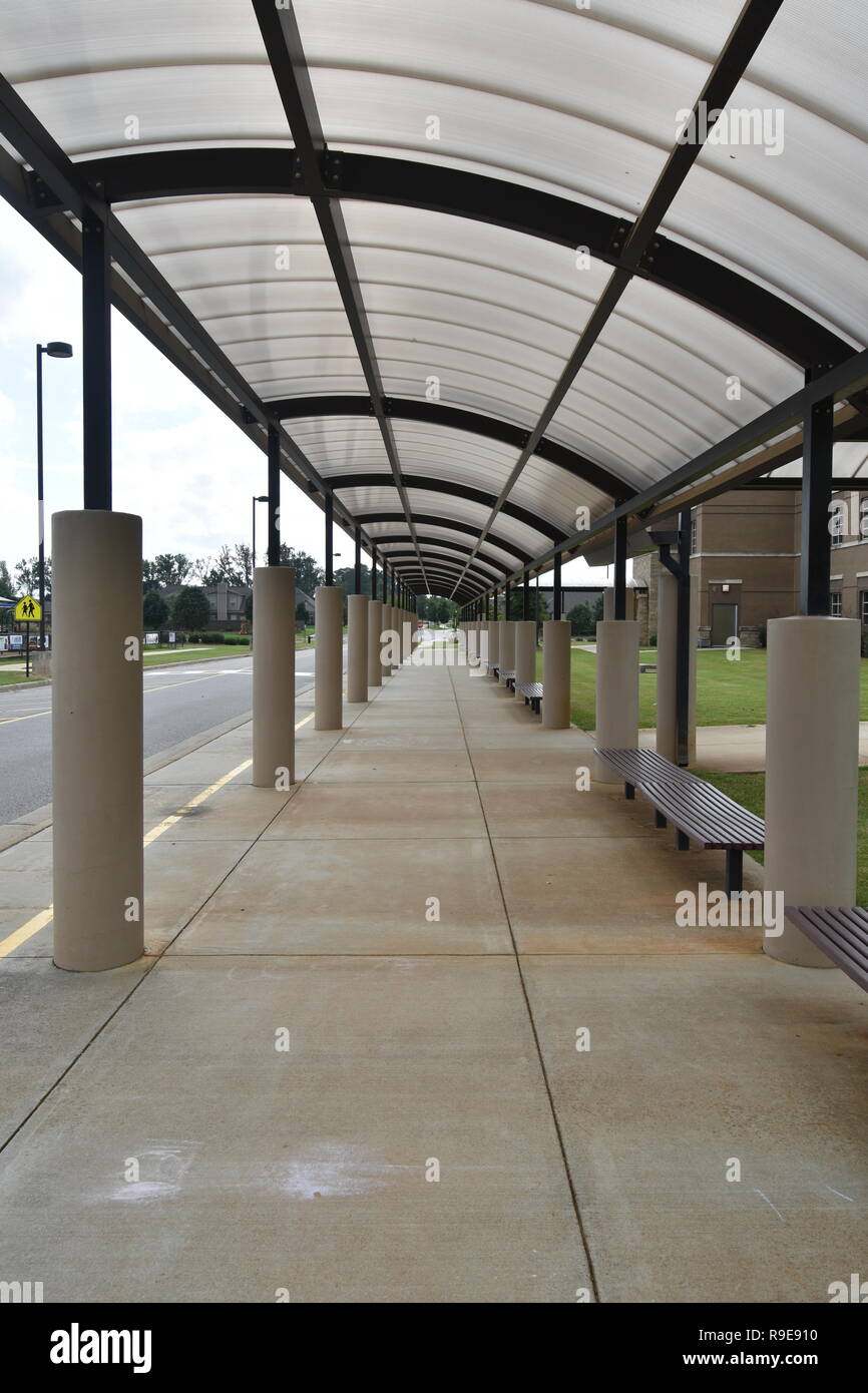 Covered walkway at passenger loading area Stock Photo - Alamy