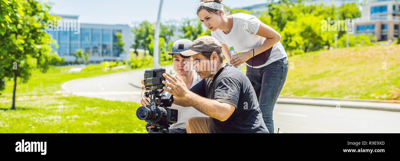 a cameraman operator discuss the shooting process with a director and ...