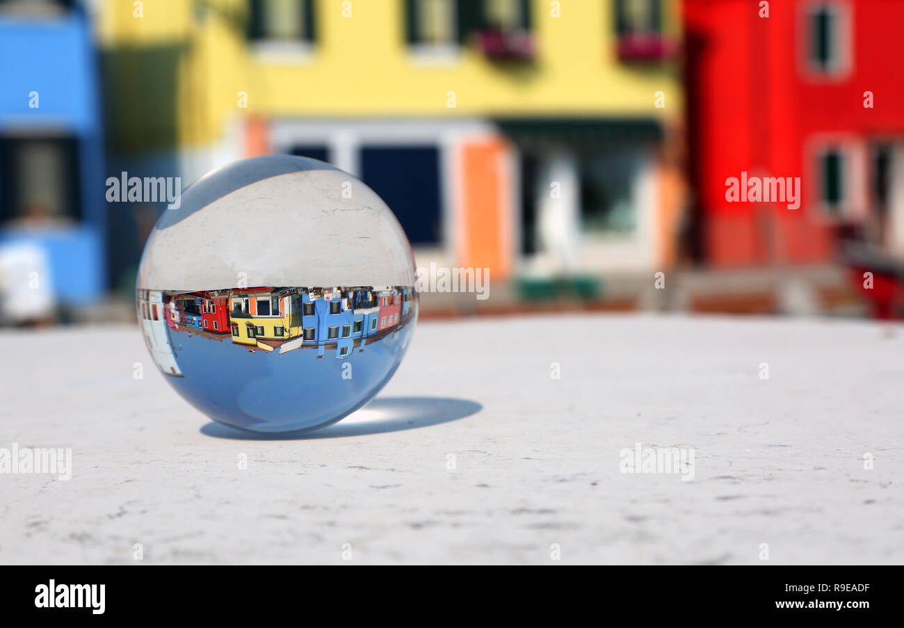 large glass sphere that acts as a lens inside which are projected the ...