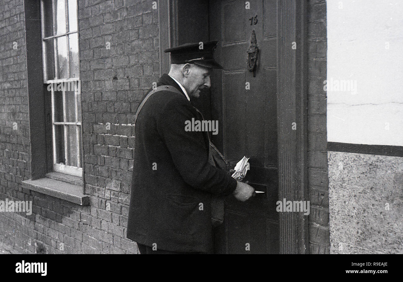 Postman delivering letter hi-res stock photography and images - Alamy