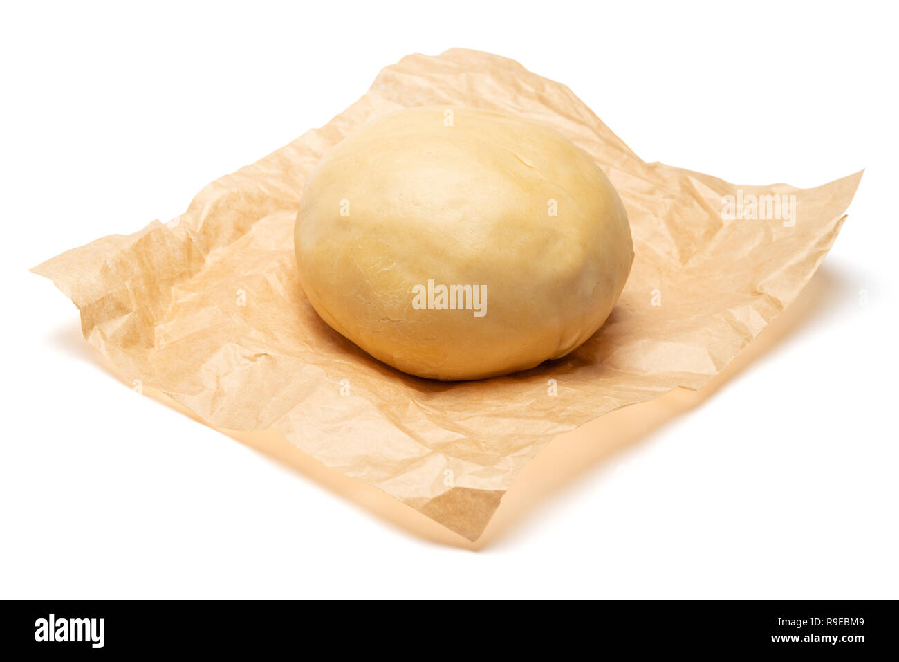 unrolled and unbaked Shortcrust pastry dough on white background Stock ...