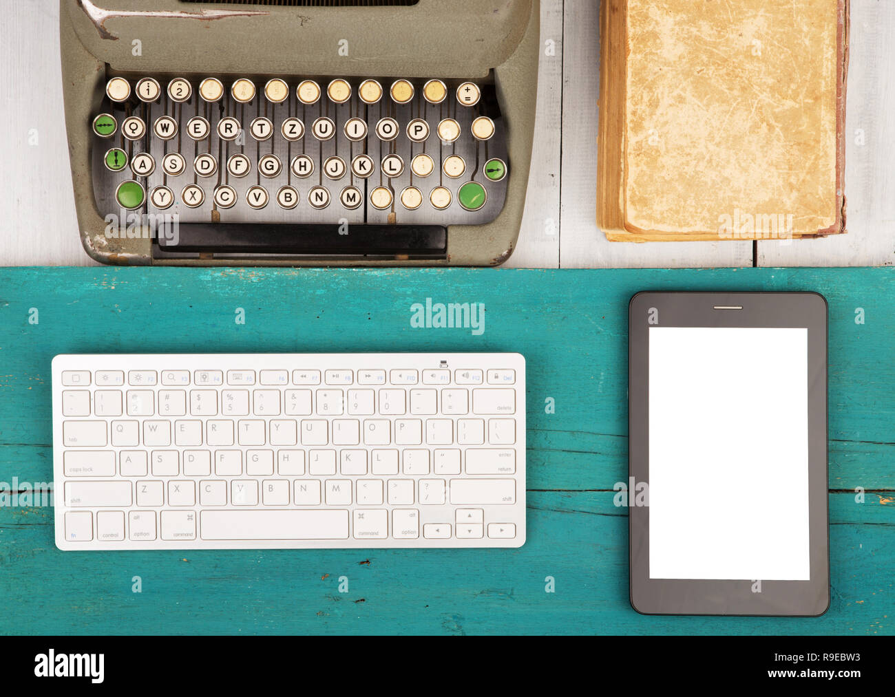 Concept of technology progress - old typewriter and new computer ...