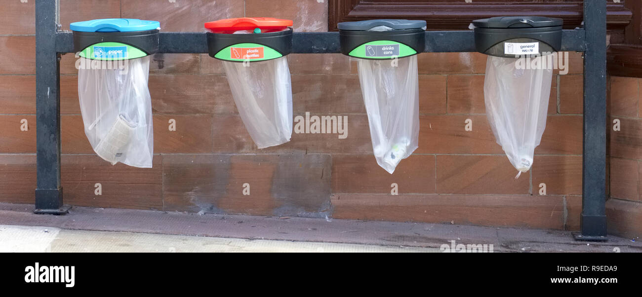 Recycling centre bin bags colour coded for plastic paper glass and ...
