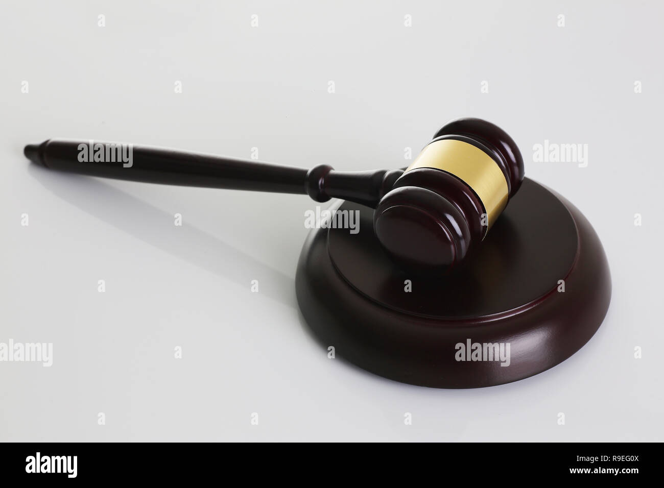 Judge hammer with stand isolated white background Stock Photo - Alamy