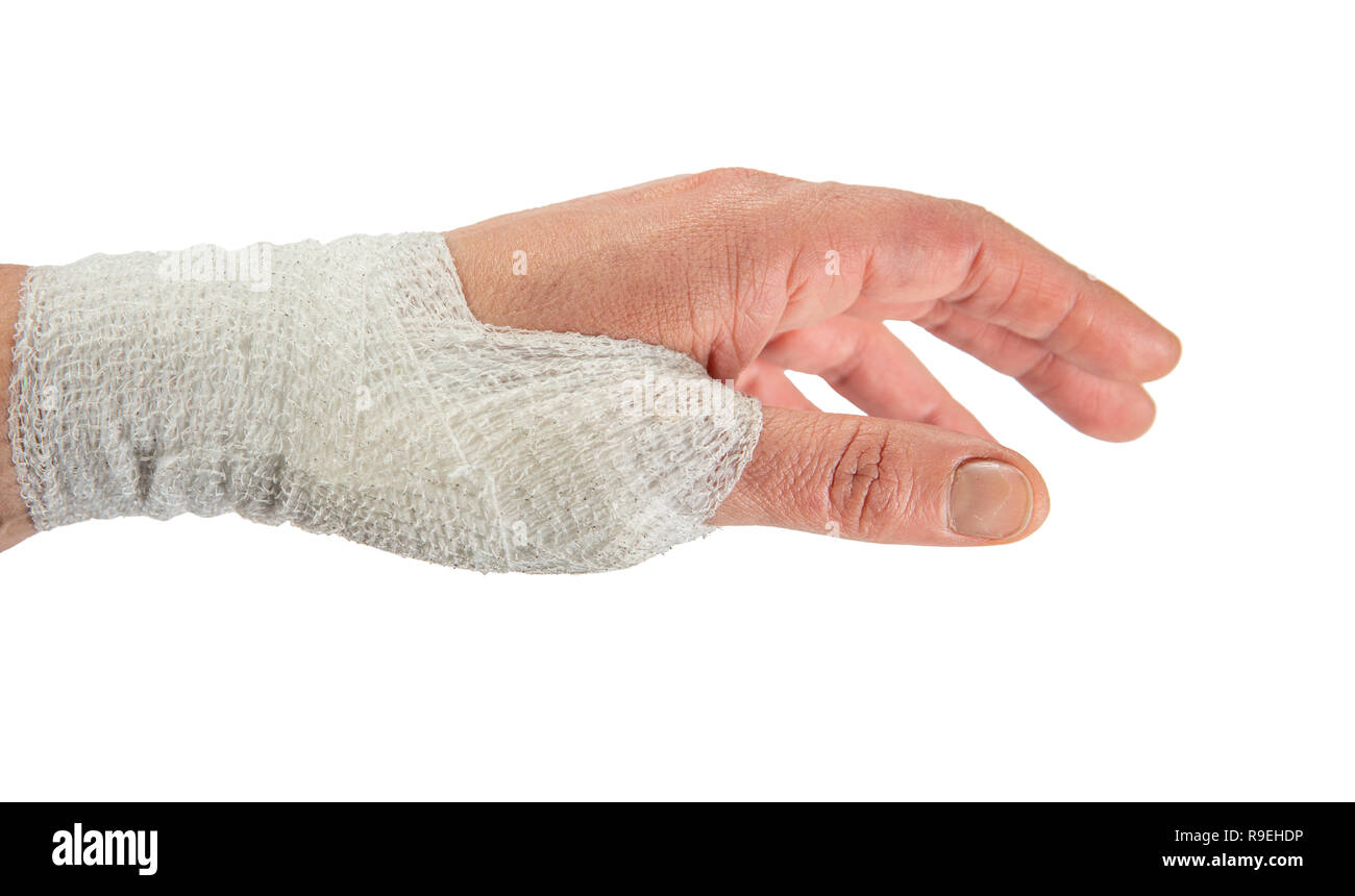 Caucasian woman left hand with surgical dressing Stock Photo - Alamy