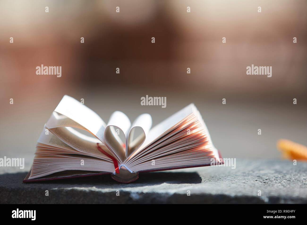 Heart book page Stock Photo - Alamy