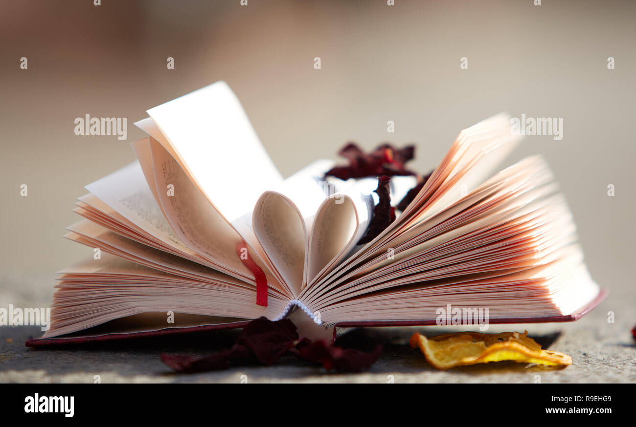 Heart book page Stock Photo - Alamy