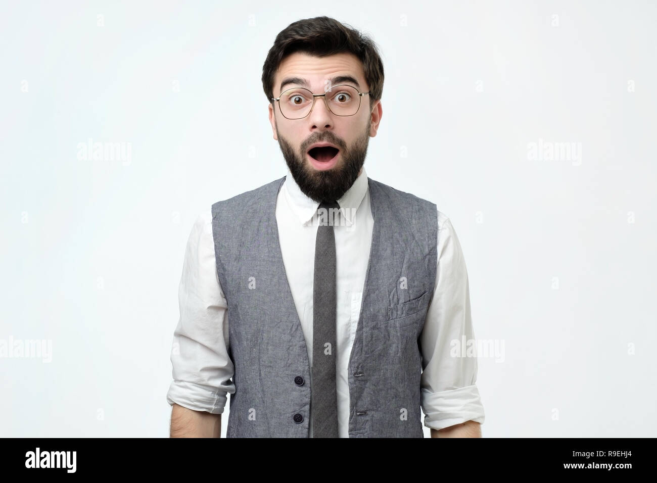 Young spanish man with shocked facial expression Stock Photo - Alamy