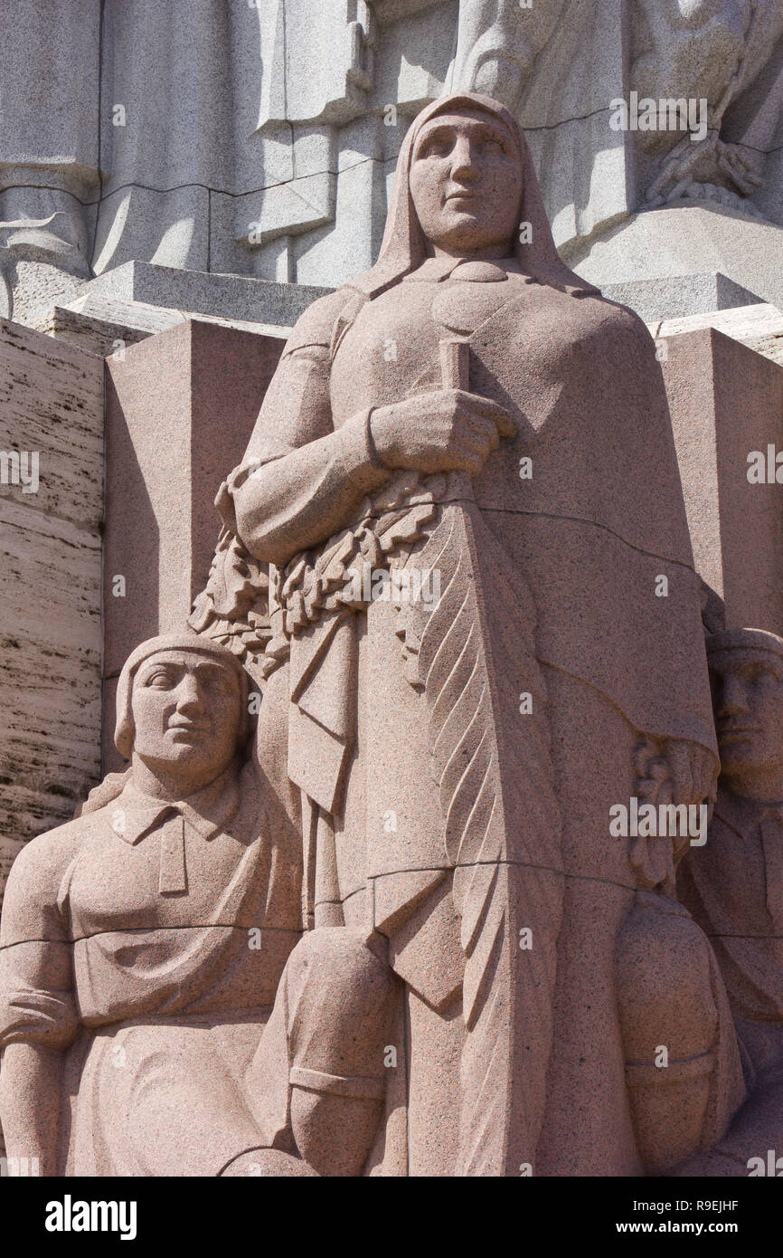 Close-up of the marble statues of the Freedom Monument in Riga, Latvia ...