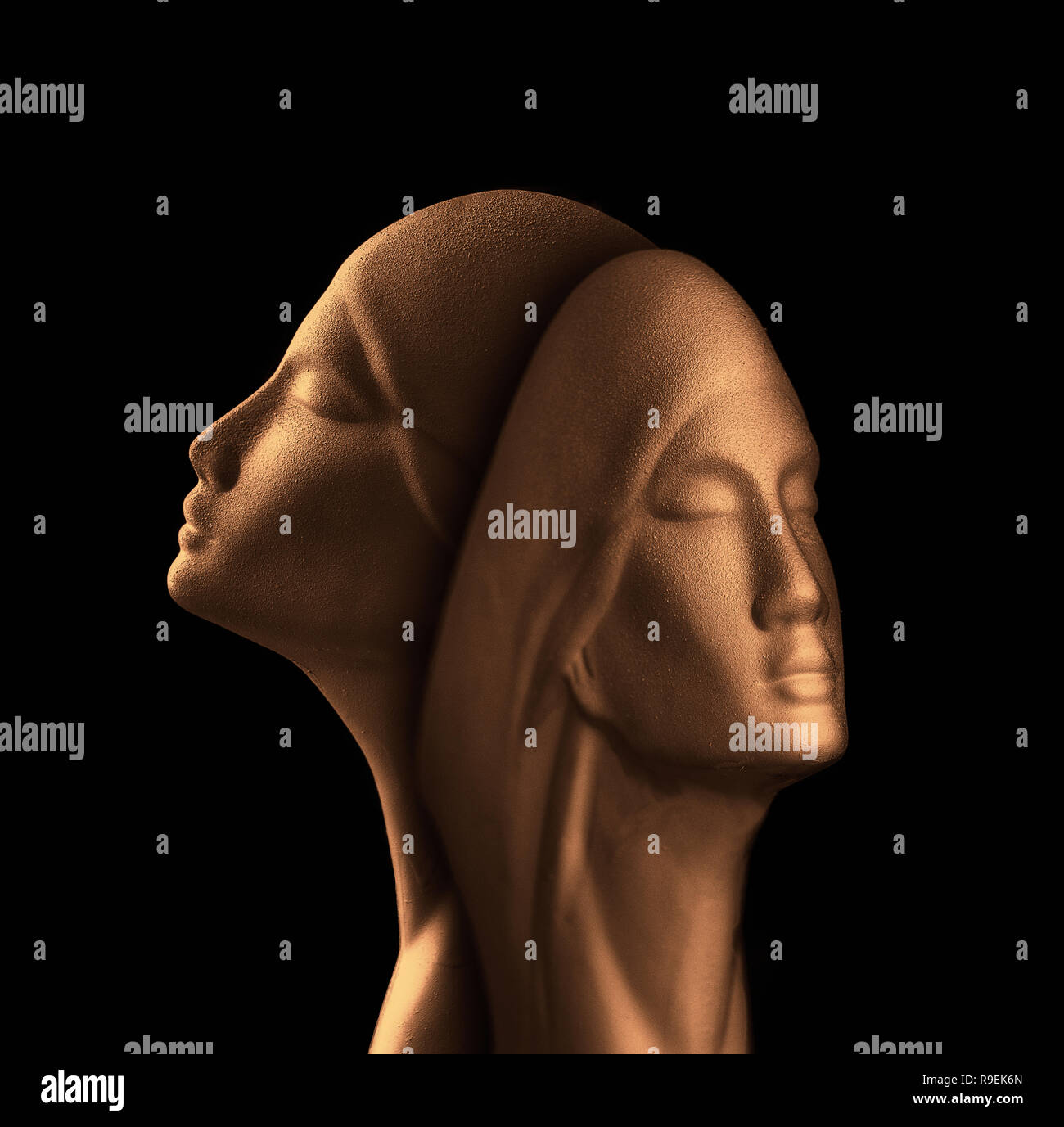 Abstract Image of Two Bronze Statues of Women Looking Away From Each ...