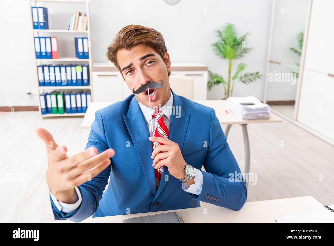 Businessman interview clown suit hi-res stock photography and images ...