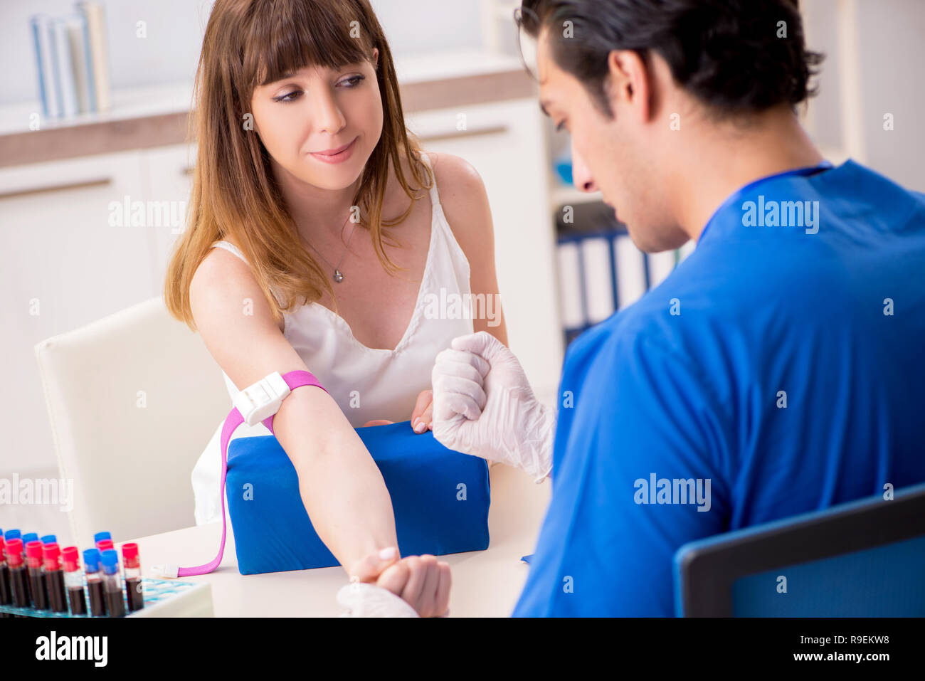 Young patient during blood test sampling procedure Stock Photo - Alamy