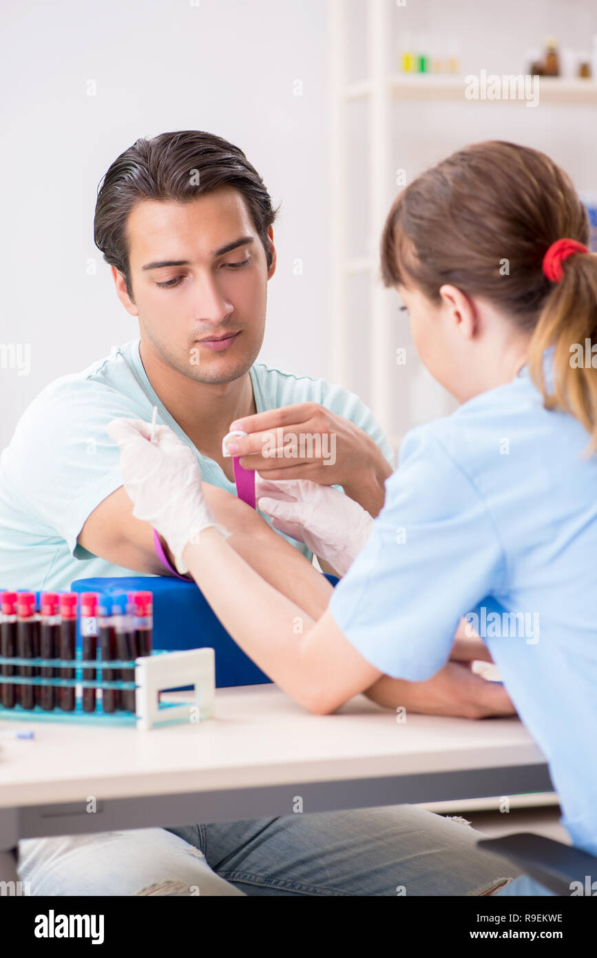 Young patient during blood test sampling procedure Stock Photo - Alamy