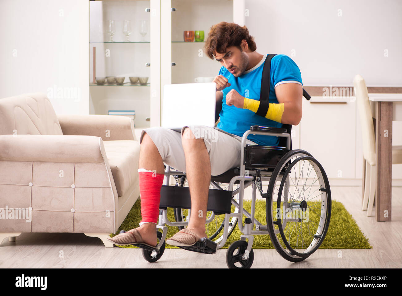 Injured man recovering from his injury Stock Photo - Alamy