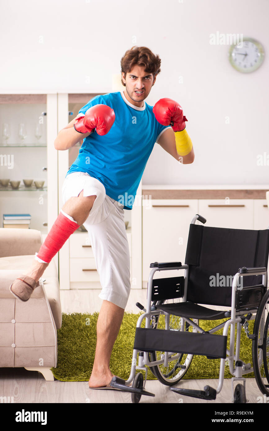Injured man recovering from his injury Stock Photo - Alamy