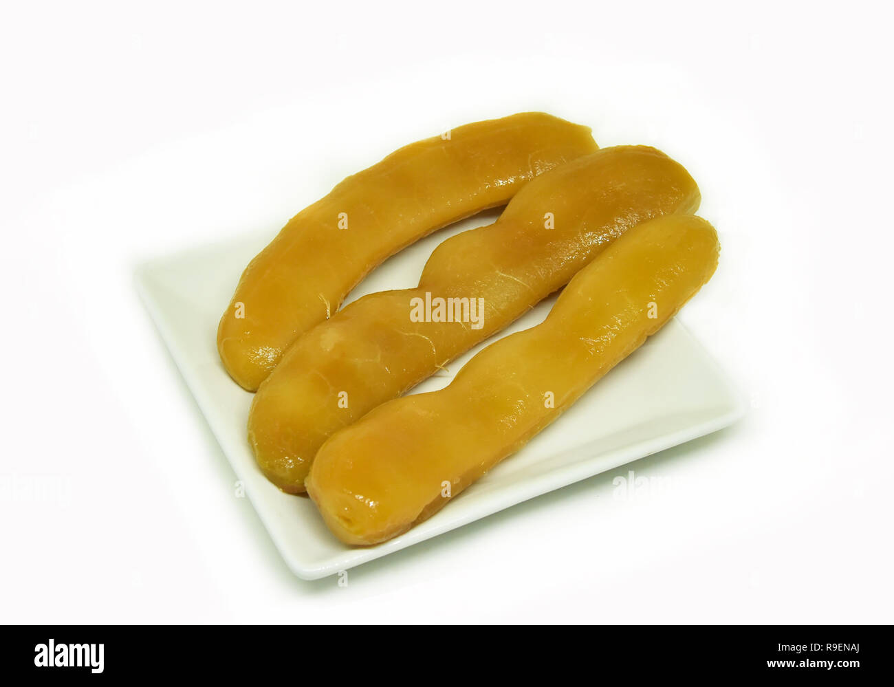 preserved sweet tamarind fruit isolated / tropical fruit peeled ...