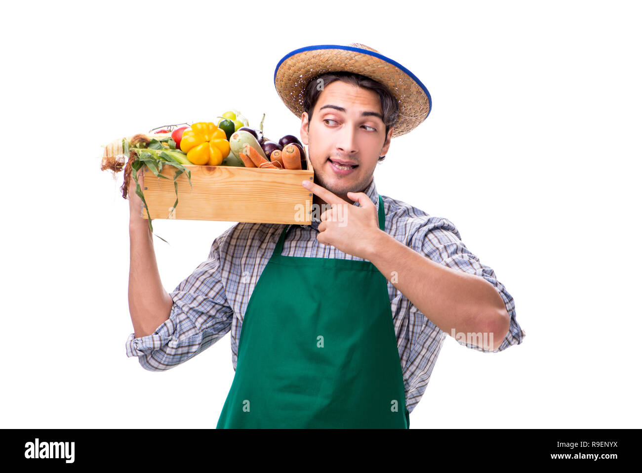 Young farmer with fresh produce isolated on white background Stock ...