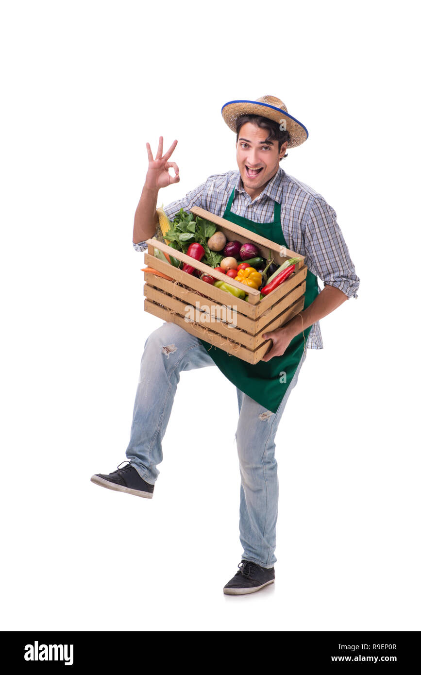 Young farmer with fresh produce isolated on white background Stock ...