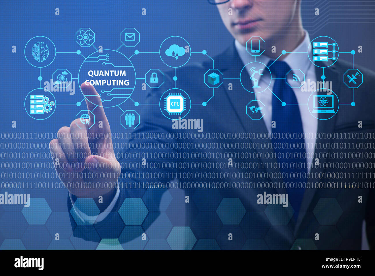 Businessman pressing virtual button in quantum computing concept Stock Photo - Alamy