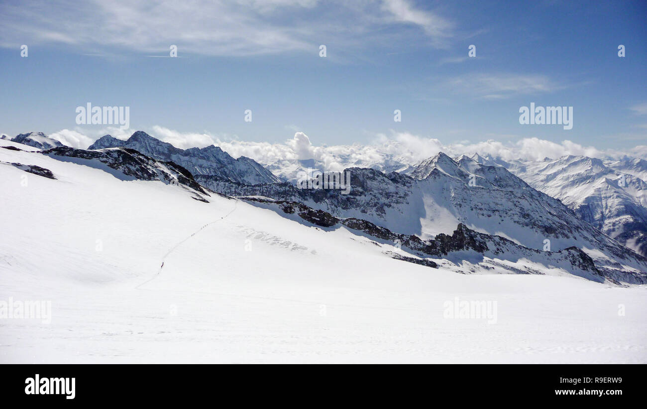 winter mountain landscape in the Austrian Alps with many backcountry ...