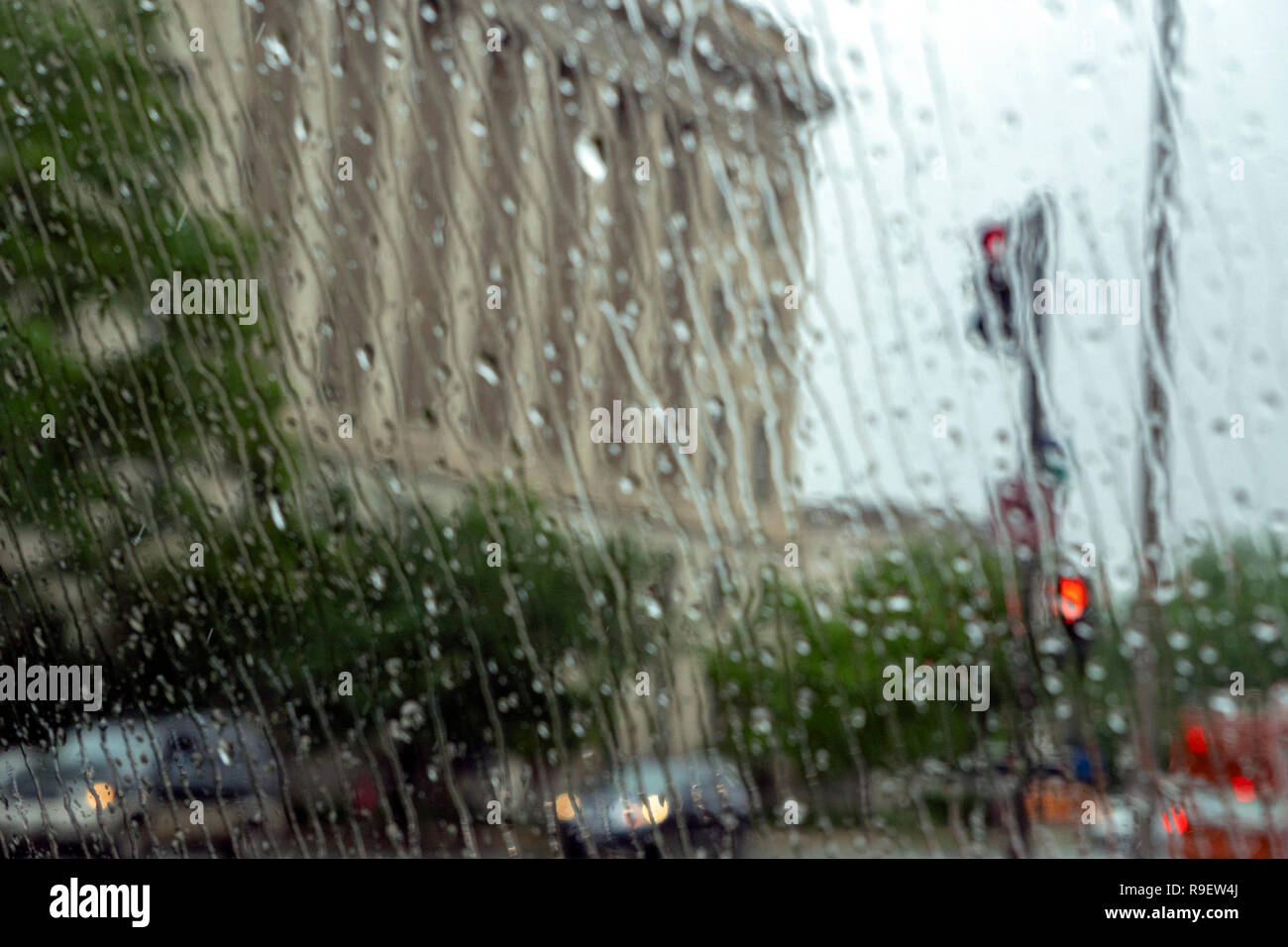 heavy rain on car glass window in washington dc usa Stock Photo - Alamy
