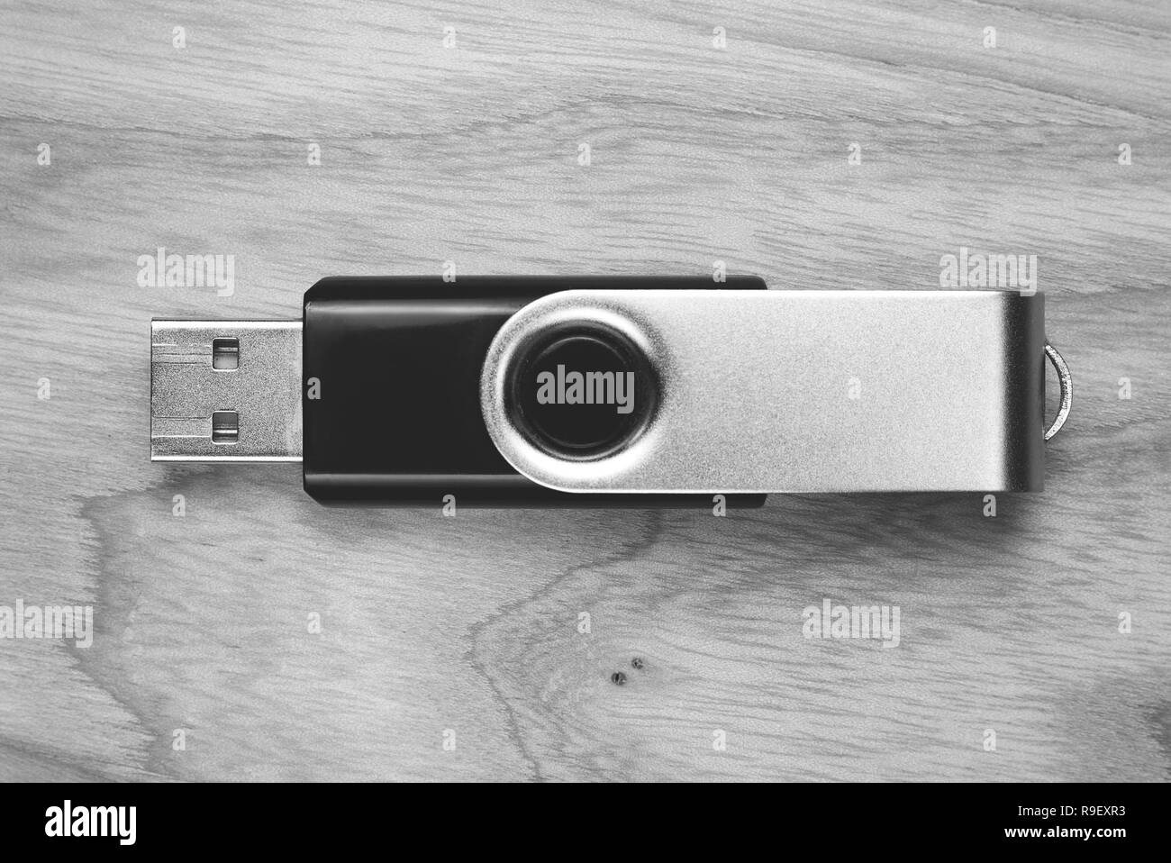 Flash memory drive on wooden desk background Stock Photo - Alamy