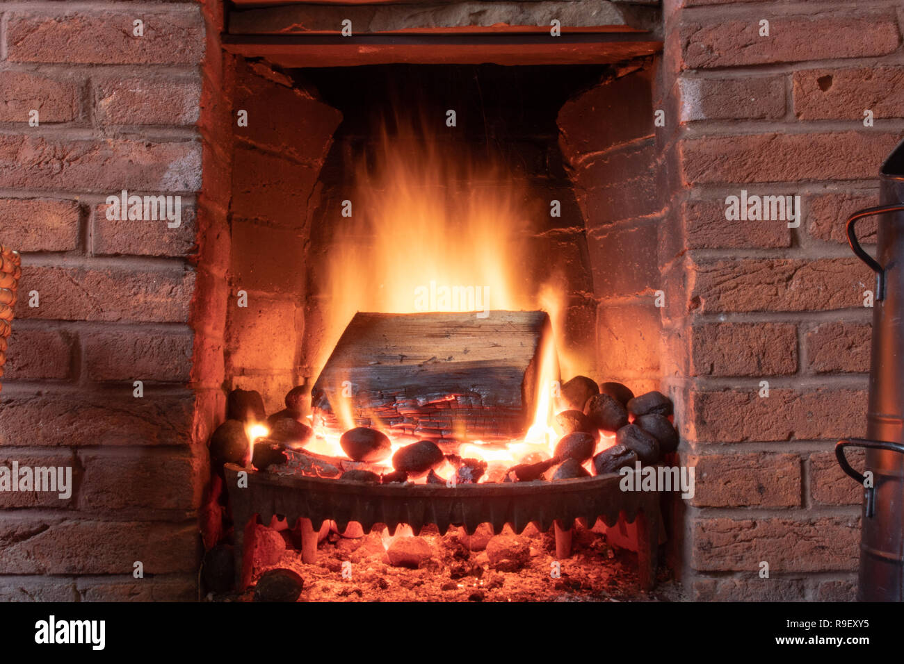 Open Fireplace with Log Fire, Winter Stock Photo - Alamy