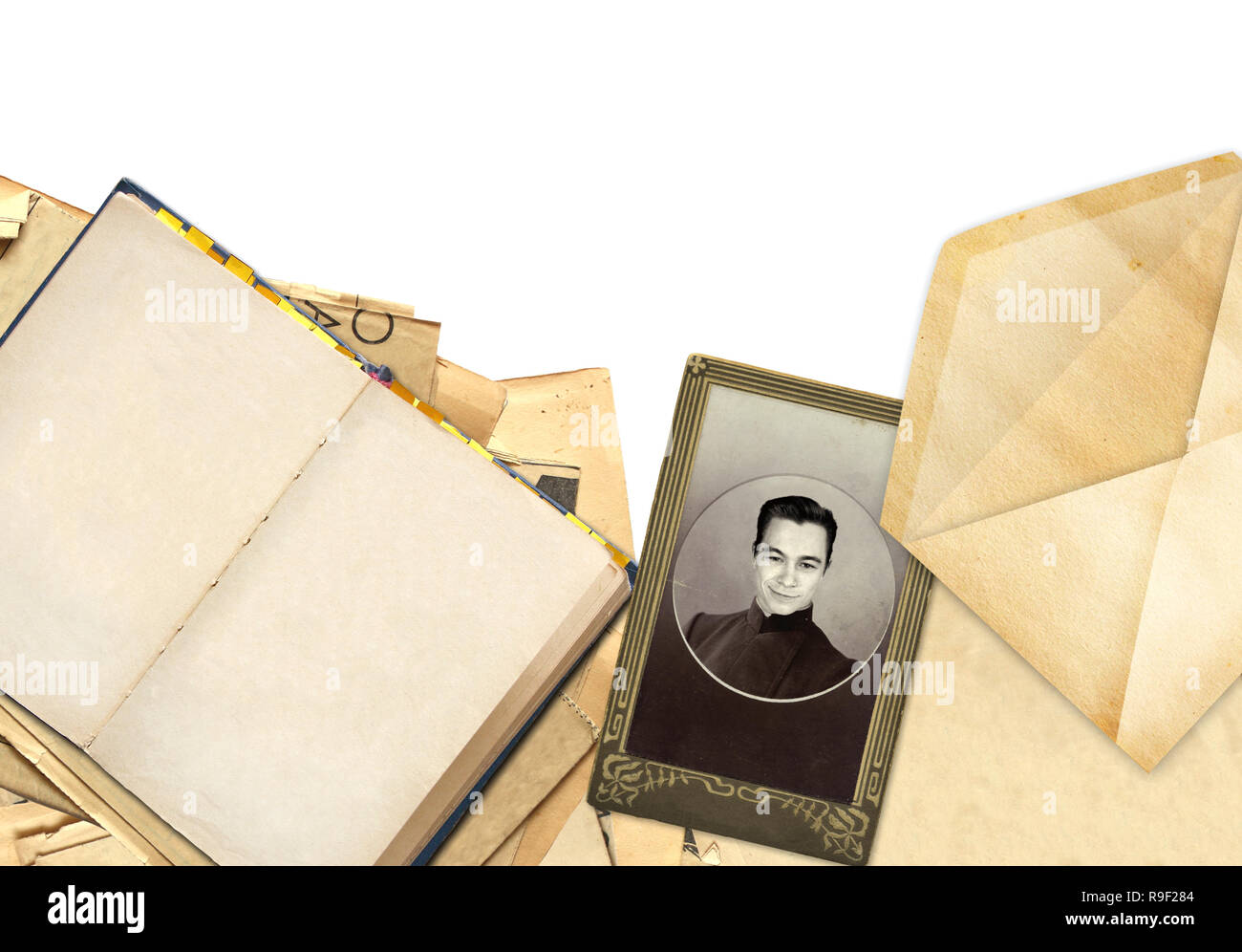 Frame with old book and photo. Objects isolated over white Stock Photo ...