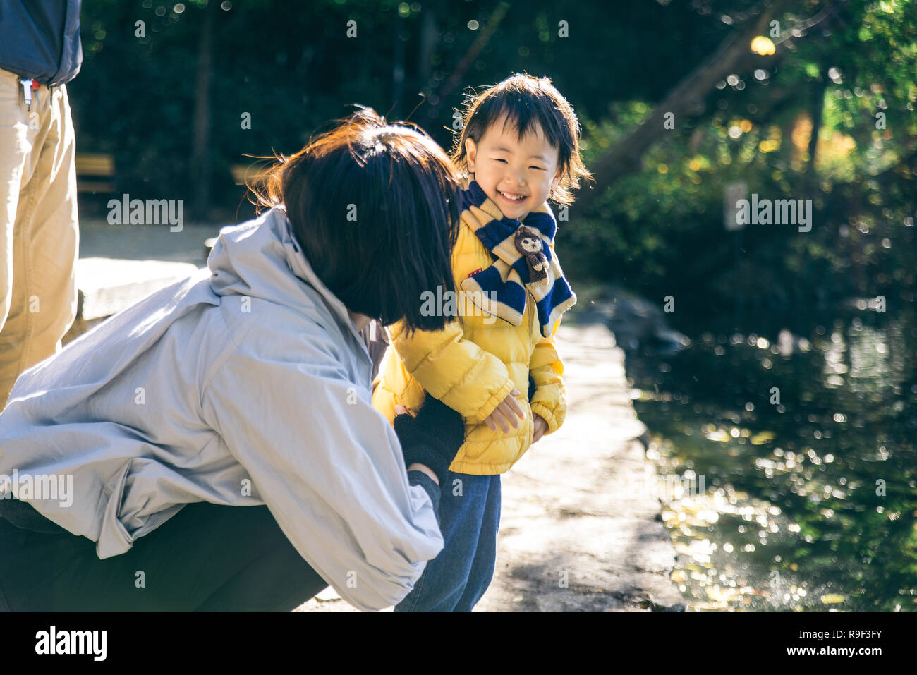 Happy and playful japanese family in a park in Tokyo Stock Photo - Alamy
