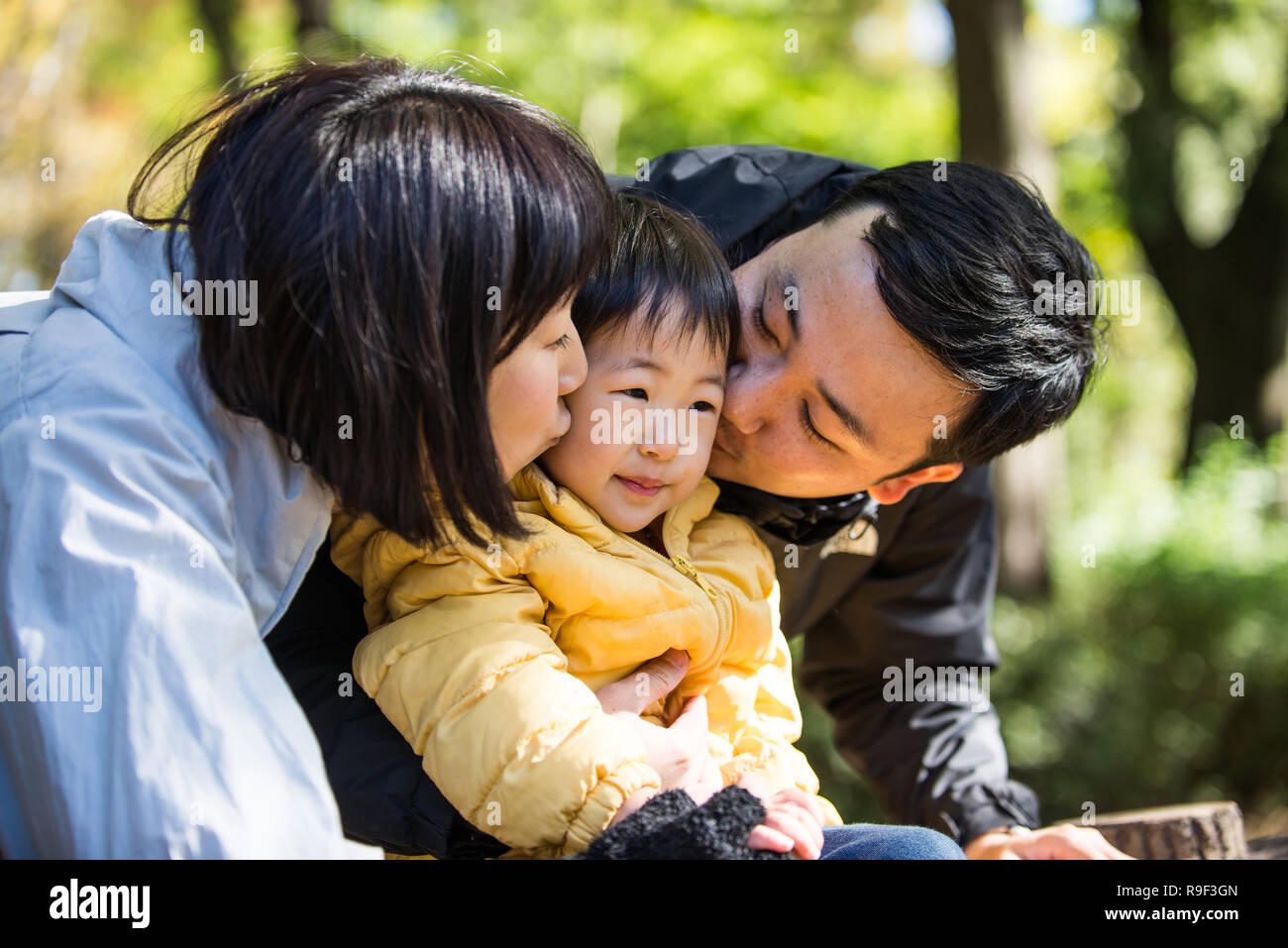 Happy and playful japanese family in a park in Tokyo Stock Photo - Alamy