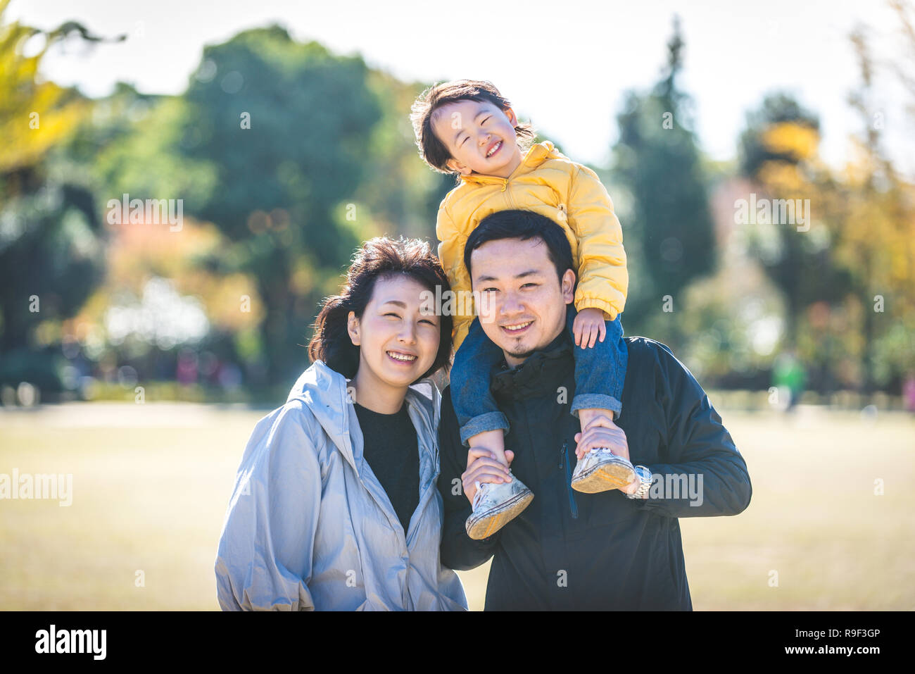 Happy and playful japanese family in a park in Tokyo Stock Photo - Alamy