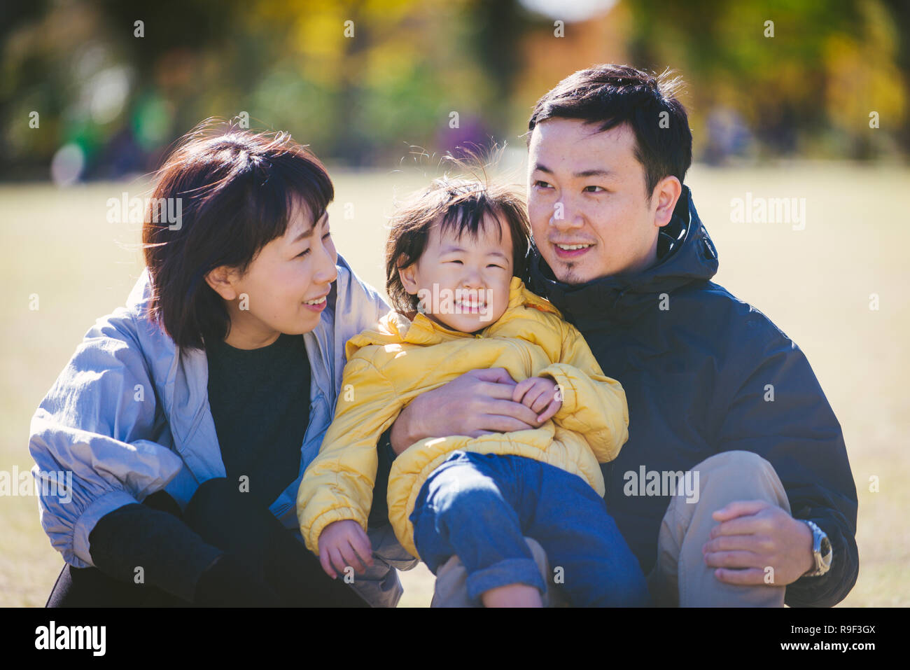 Happy and playful japanese family in a park in Tokyo Stock Photo - Alamy