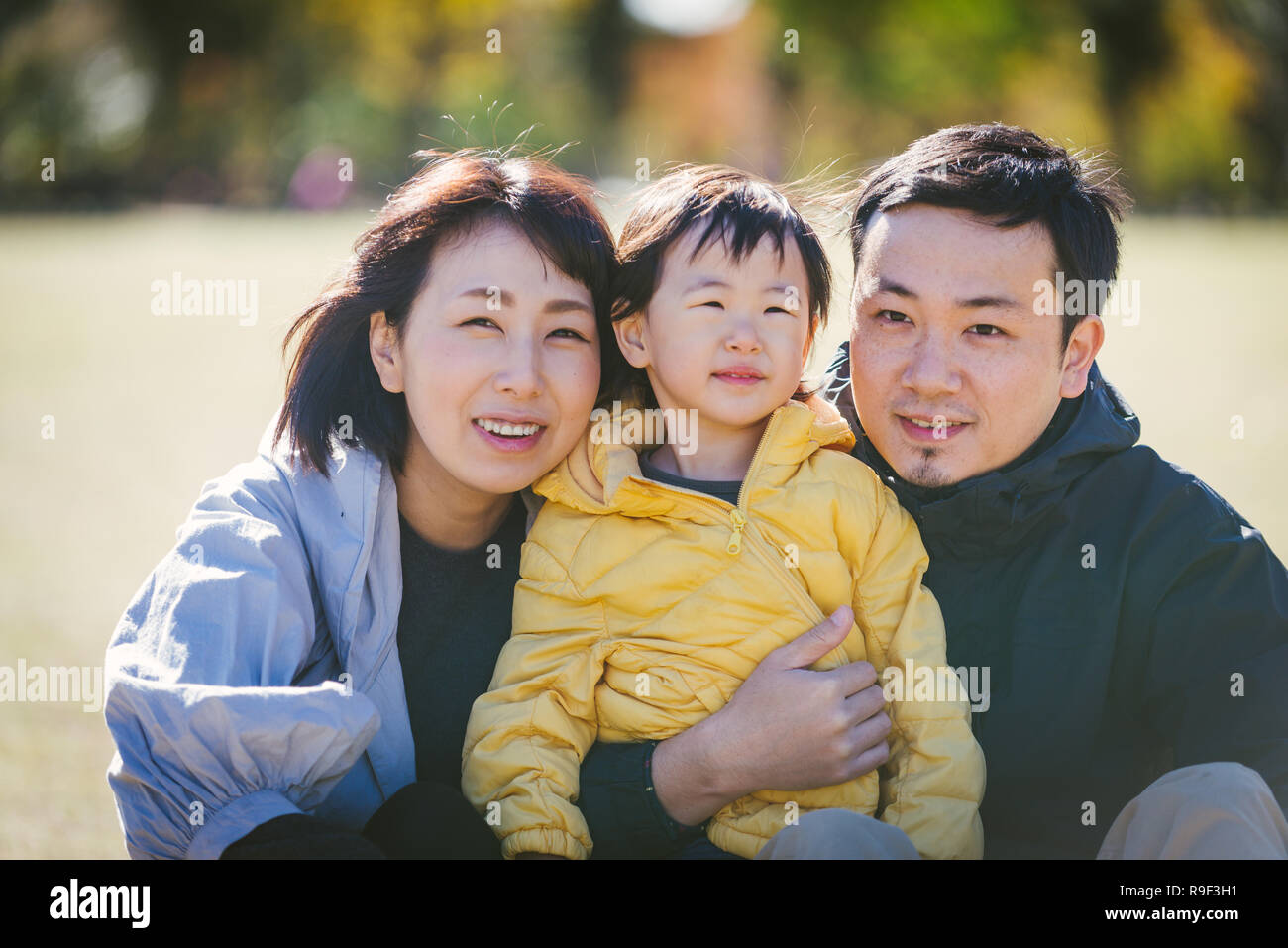 Happy and playful japanese family in a park in Tokyo Stock Photo - Alamy
